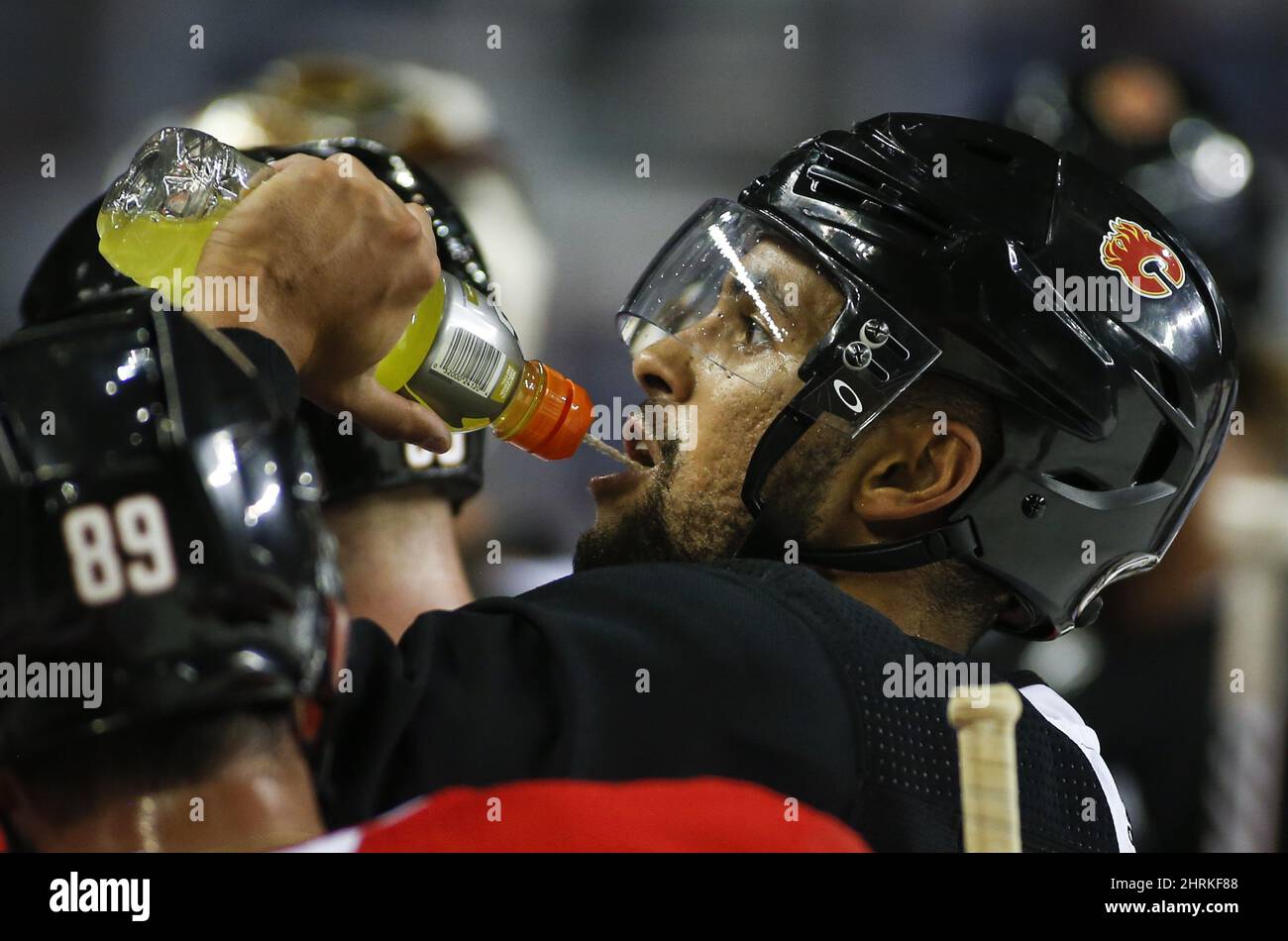 Calgary Flames' Oliver Kylington takes a break during training camp in ...