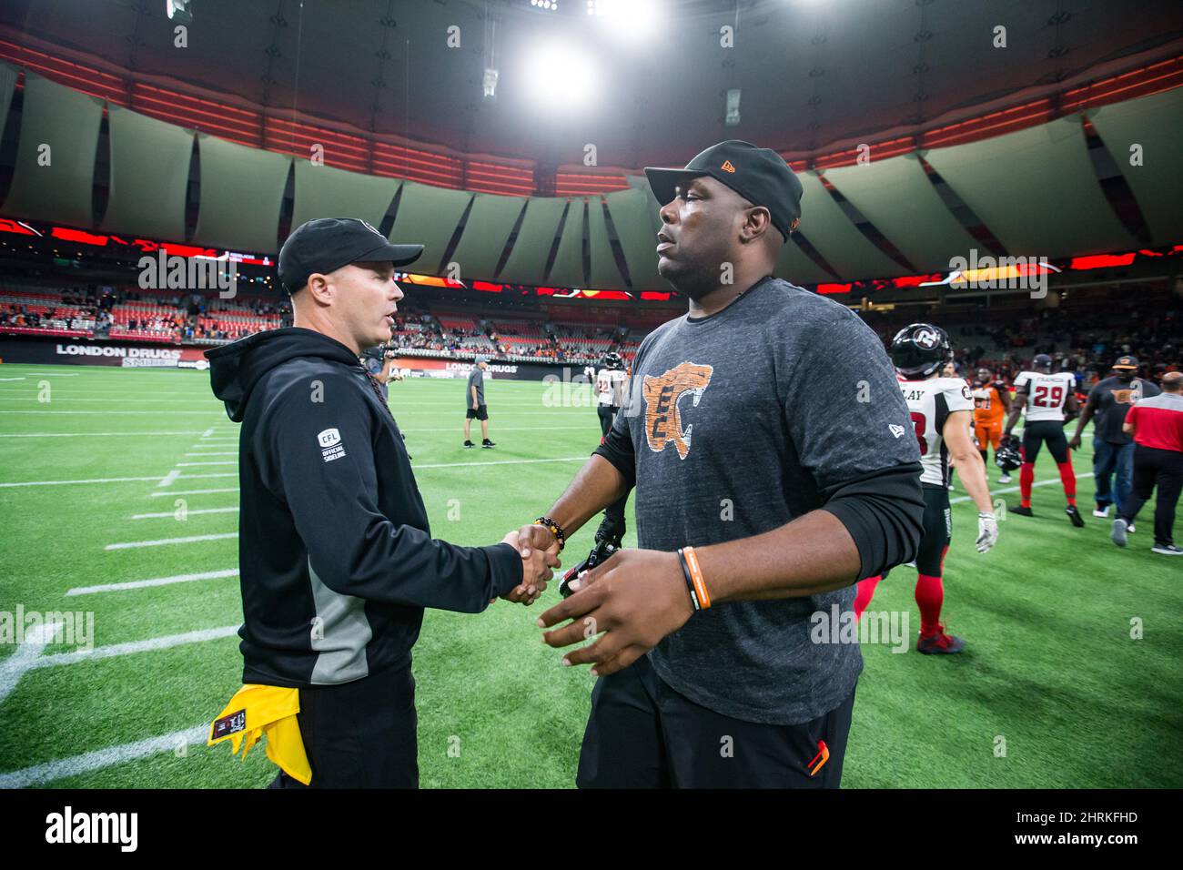Ottawa Redblacks head coach Rick Campbell, left, and B.C. Lions head ...