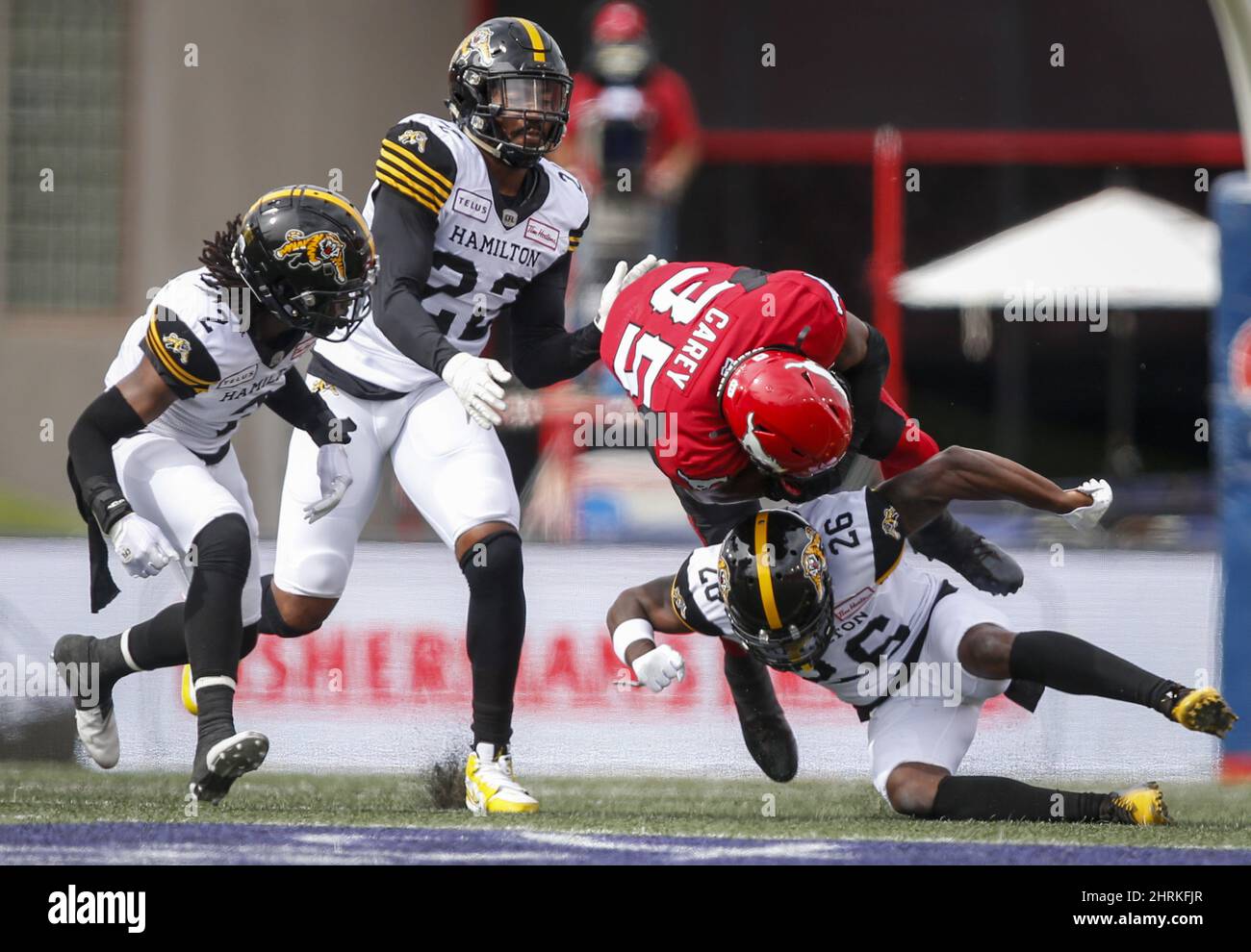 Hamilton Tiger-Cats' Cariel Brooks, right, brings down Calgary ...