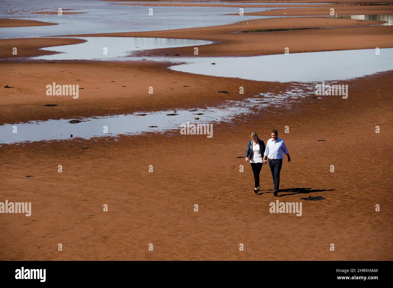 Federal Conservative leader Andrew Scheer and his wife Jill walk on the ...