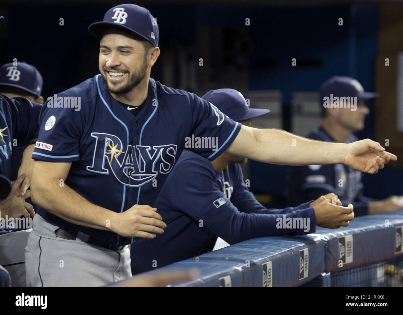 Tampa Bay Rays' Travis D'Arnaud relaxes in the dugout in the fourth ...