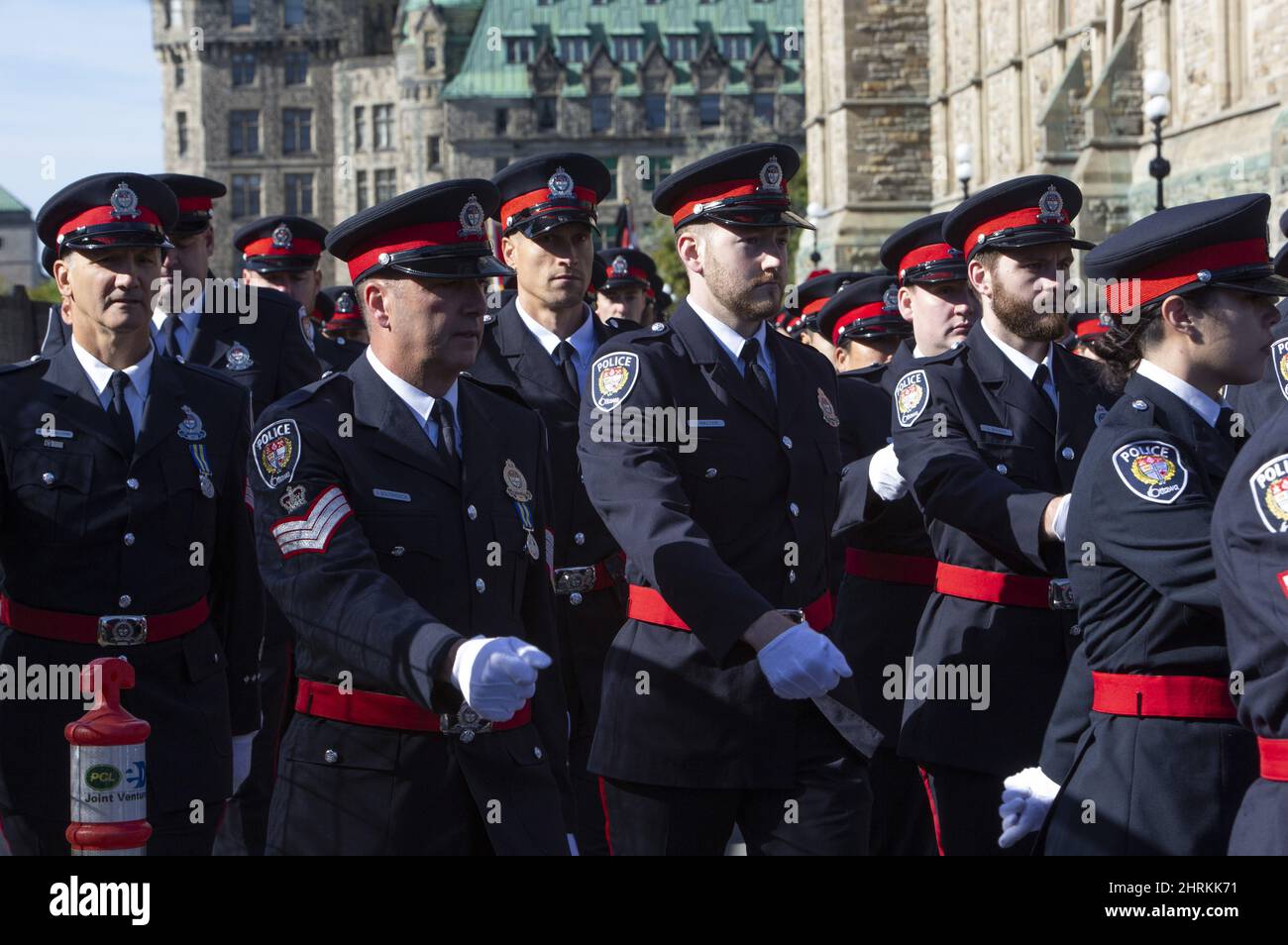 Members of the Ottawa Police Force march in honour of fallen Canadian ...