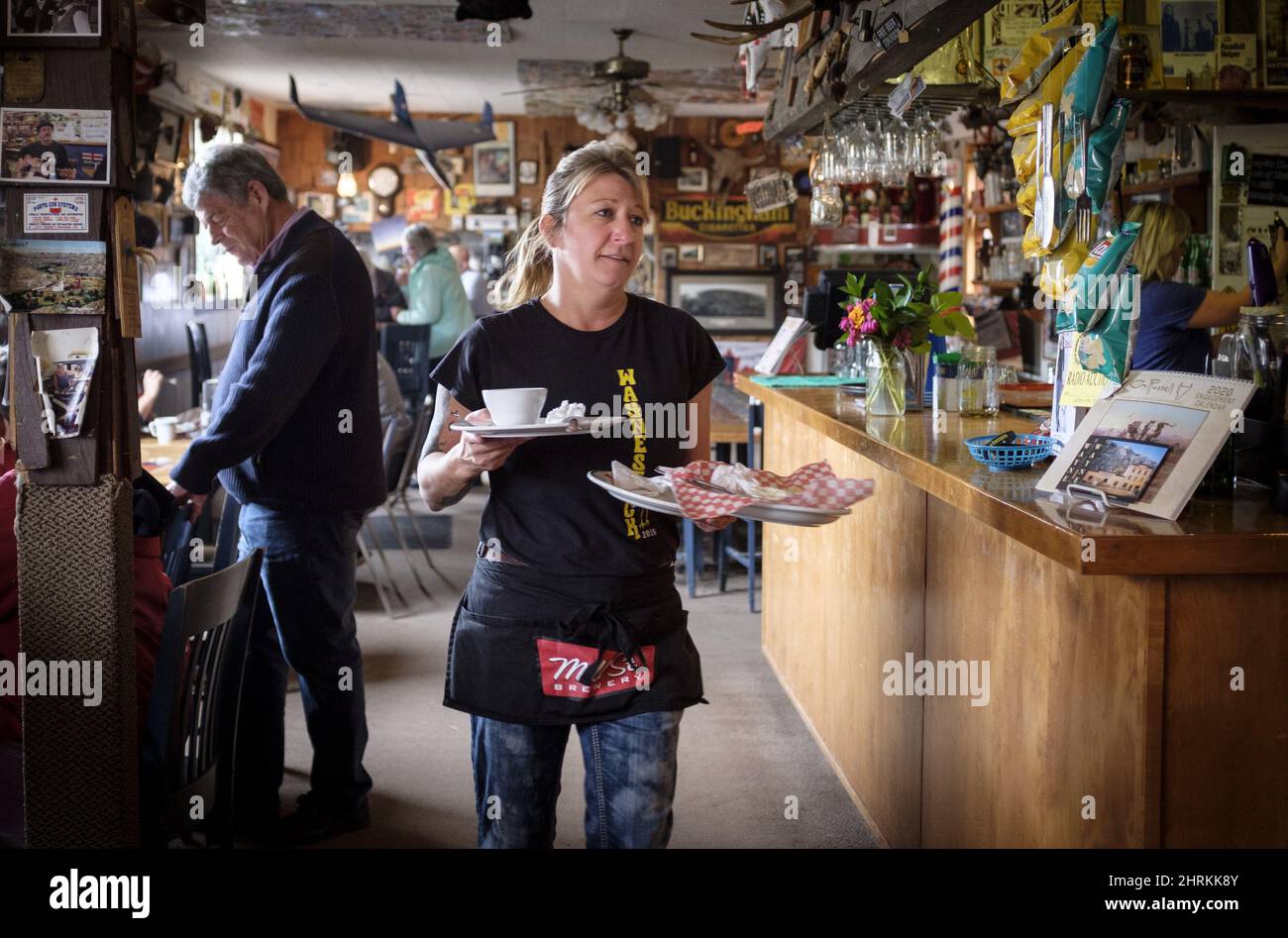 Waitress Joanne Guenther handles orders at the historic and colourful ...