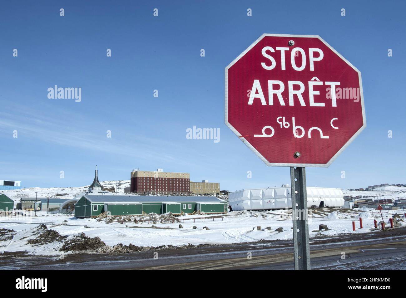 A stop sign in English, French and Inuktut syllabics is seen in Iqaluit ...