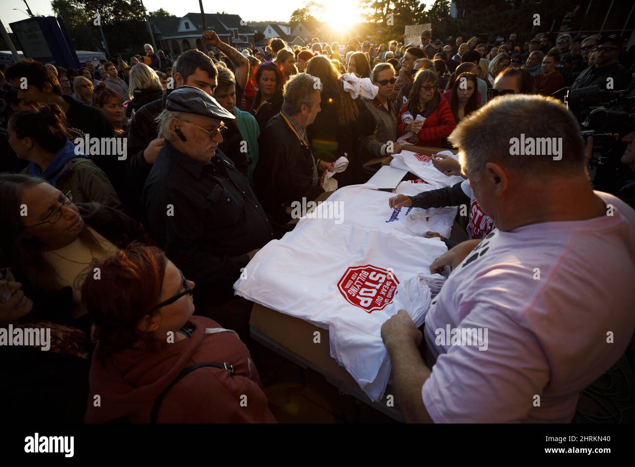 Anti-Bullying T-shirts are distributed during a candlelight vigil for ...