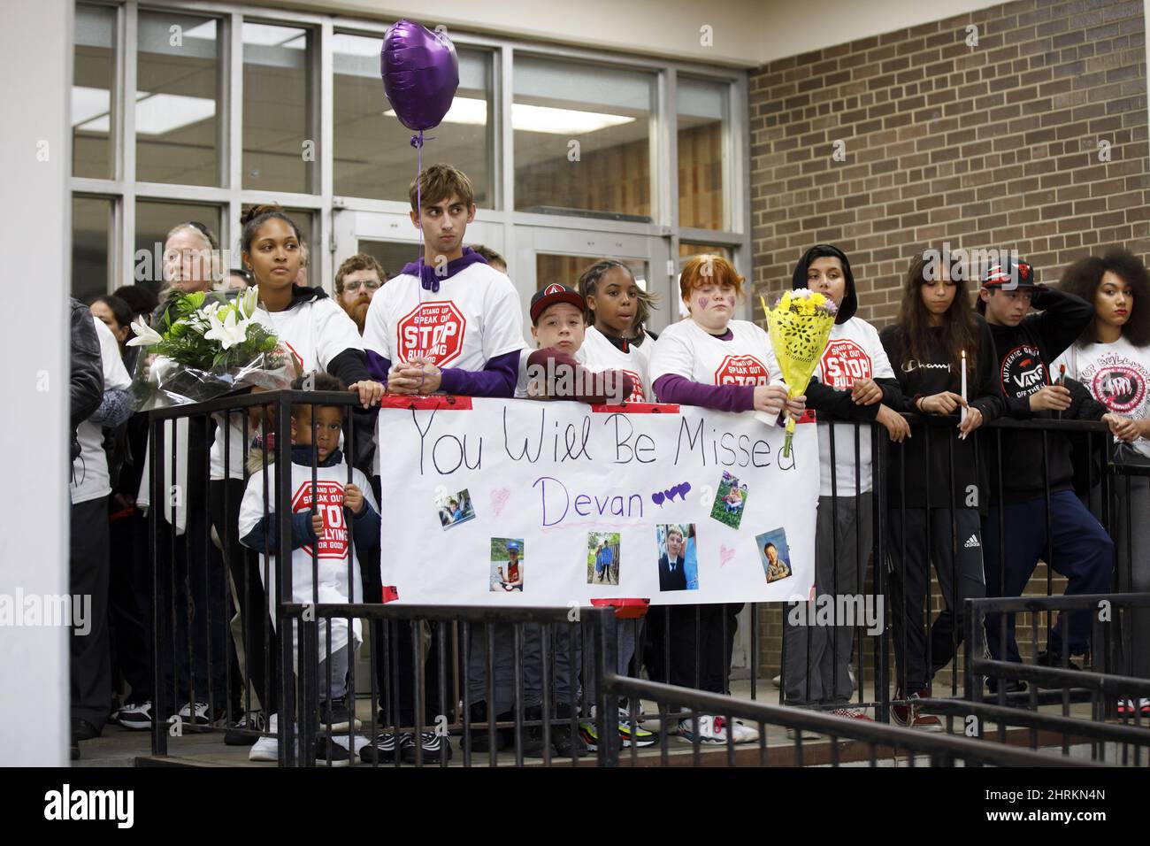 Mourners gather during a candlelight vigil for murdered 14-year-old ...