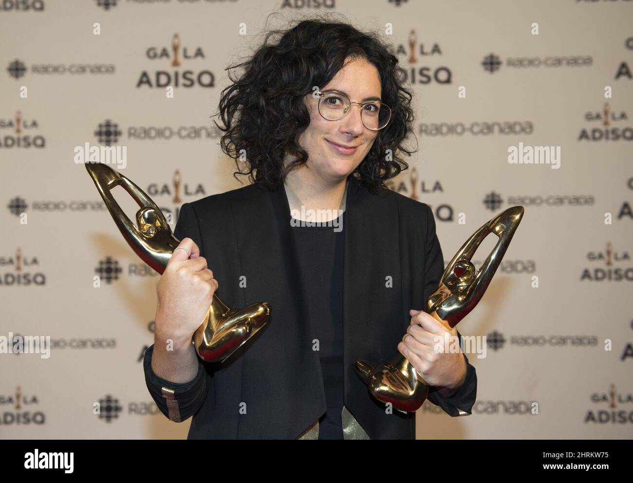 Alexandra Streliski holds up her trophies at the Gala Adisq awards ...