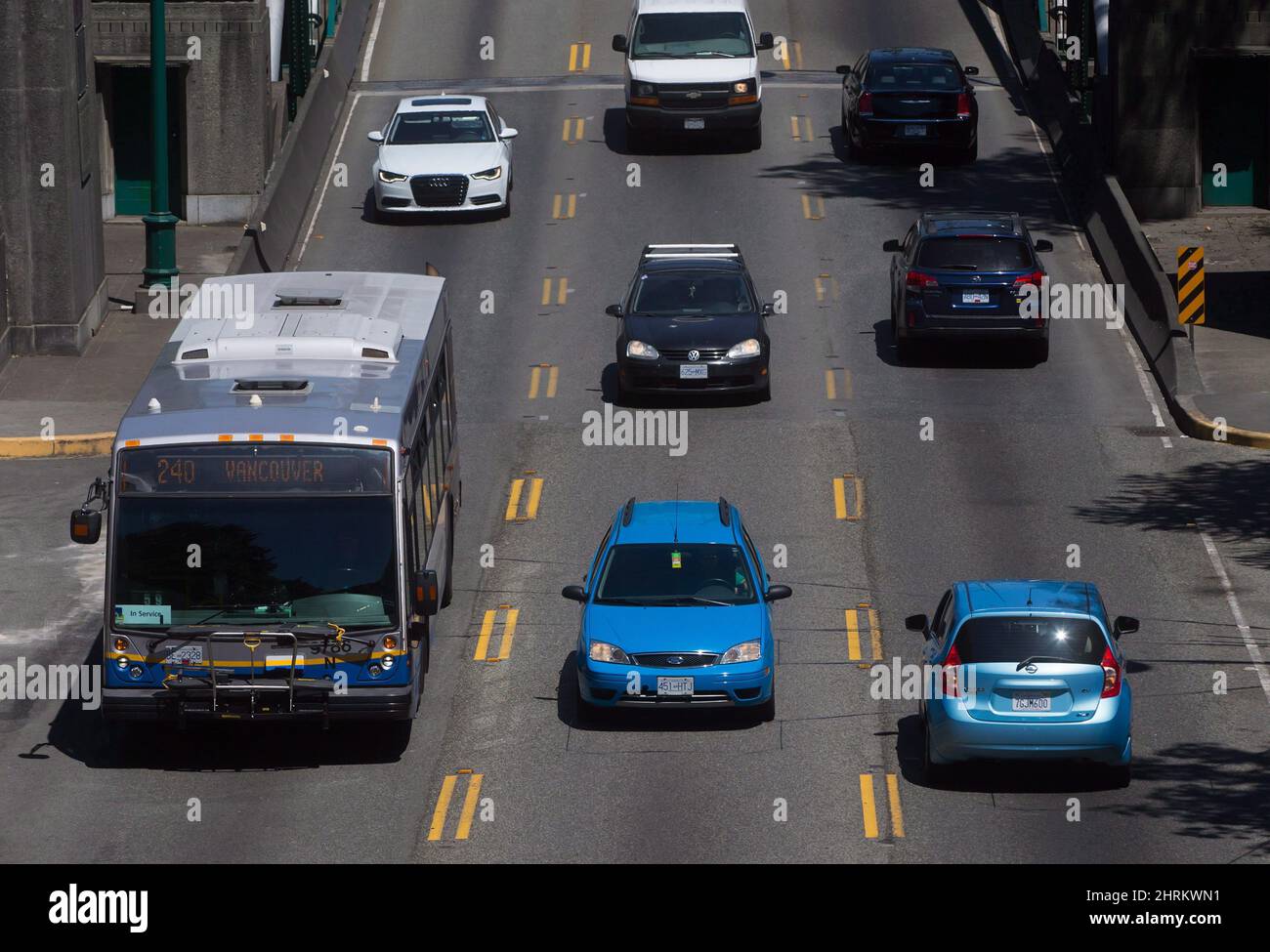 A transit bus enters the Stanley Park causeway after crossing over the ...