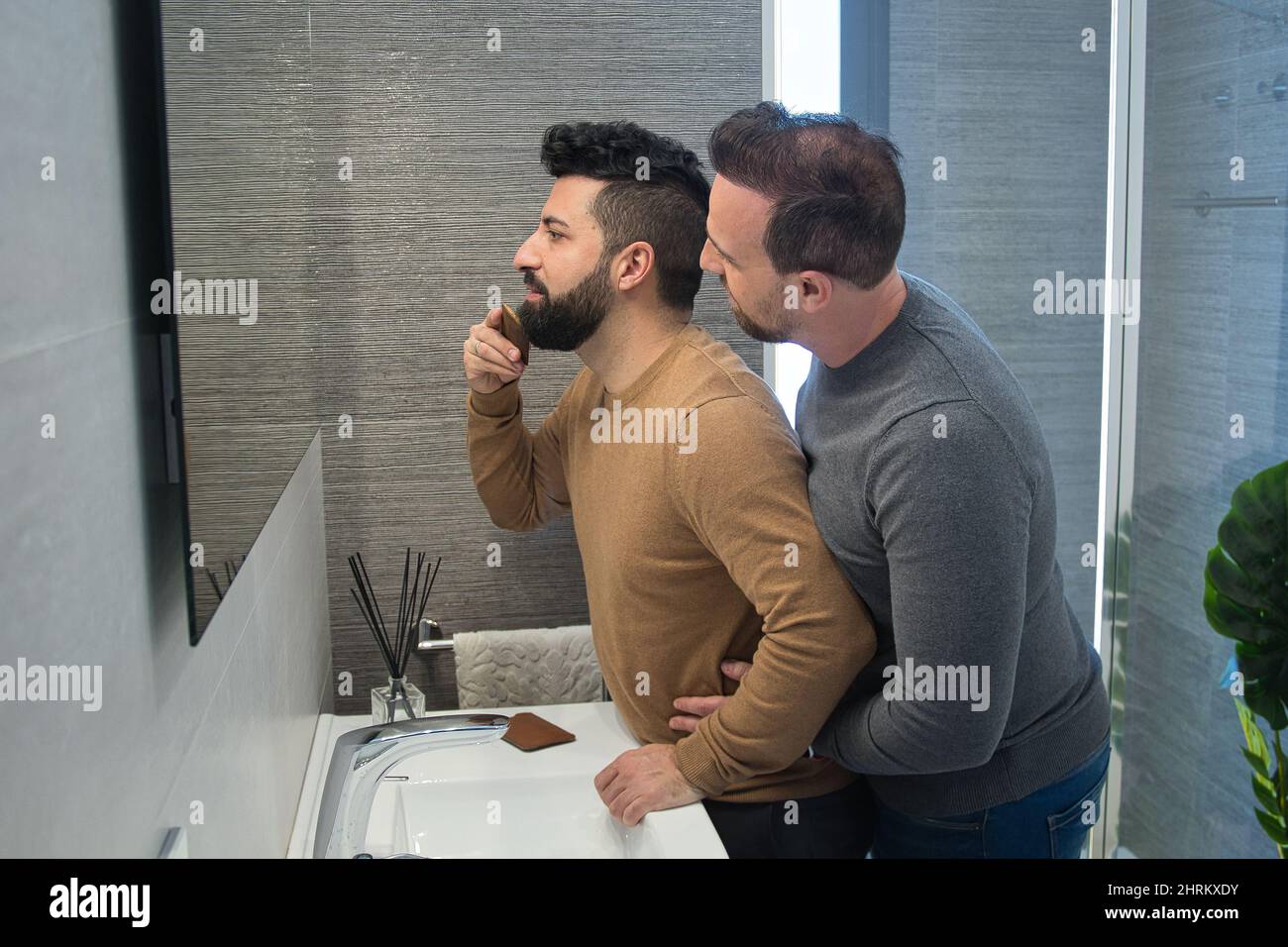 Couple hugging in bathroom hi-res stock photography and images - Alamy