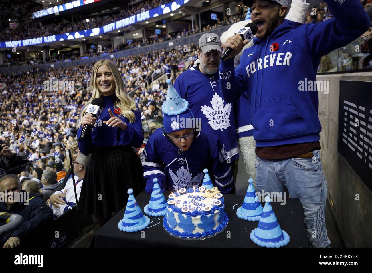 Kade Foster, 11, blows out birthday candles as fans in Scotiabank Arena ...