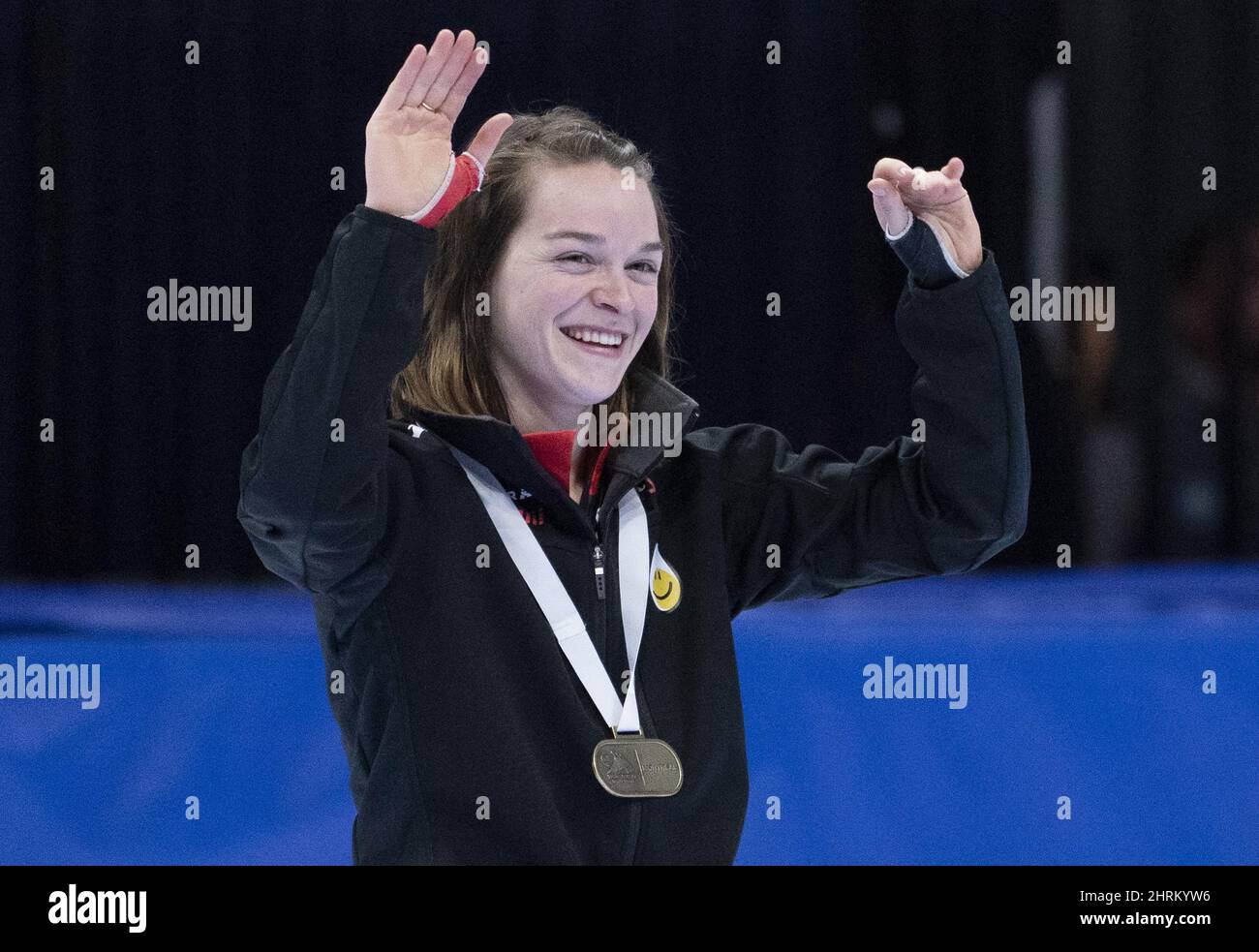 Canada's Kim Boutin waves to the crowd after winning the gold medal in ...