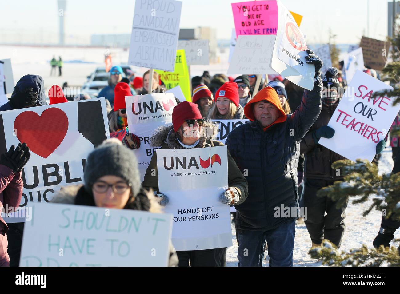 Hundreds of protesters march outside the Alberta United Conservative ...