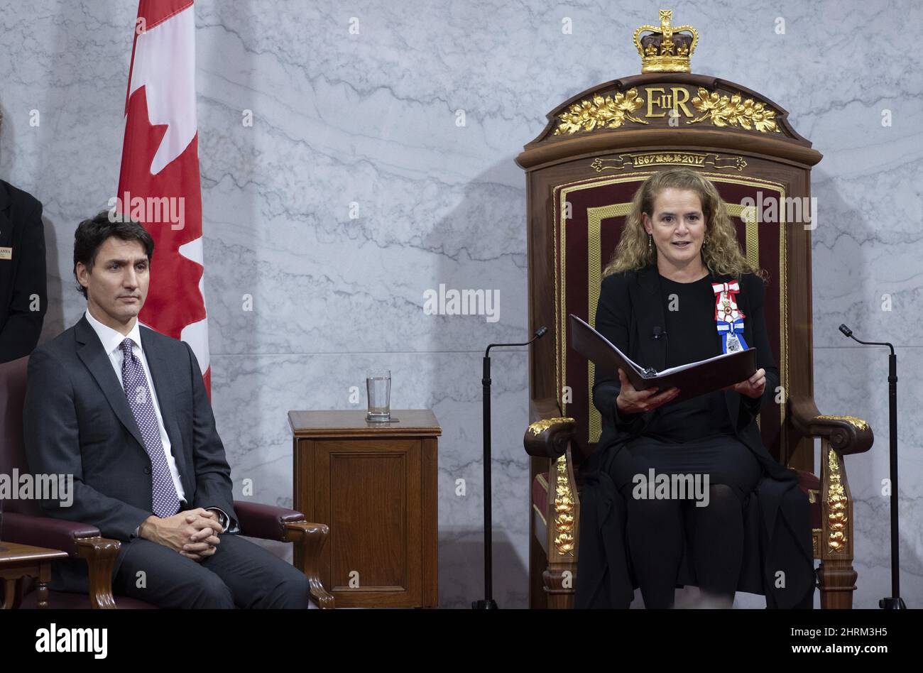 Prime Minister Justin Trudeau looks on as Governor General Julie Payette delivers the Throne ...