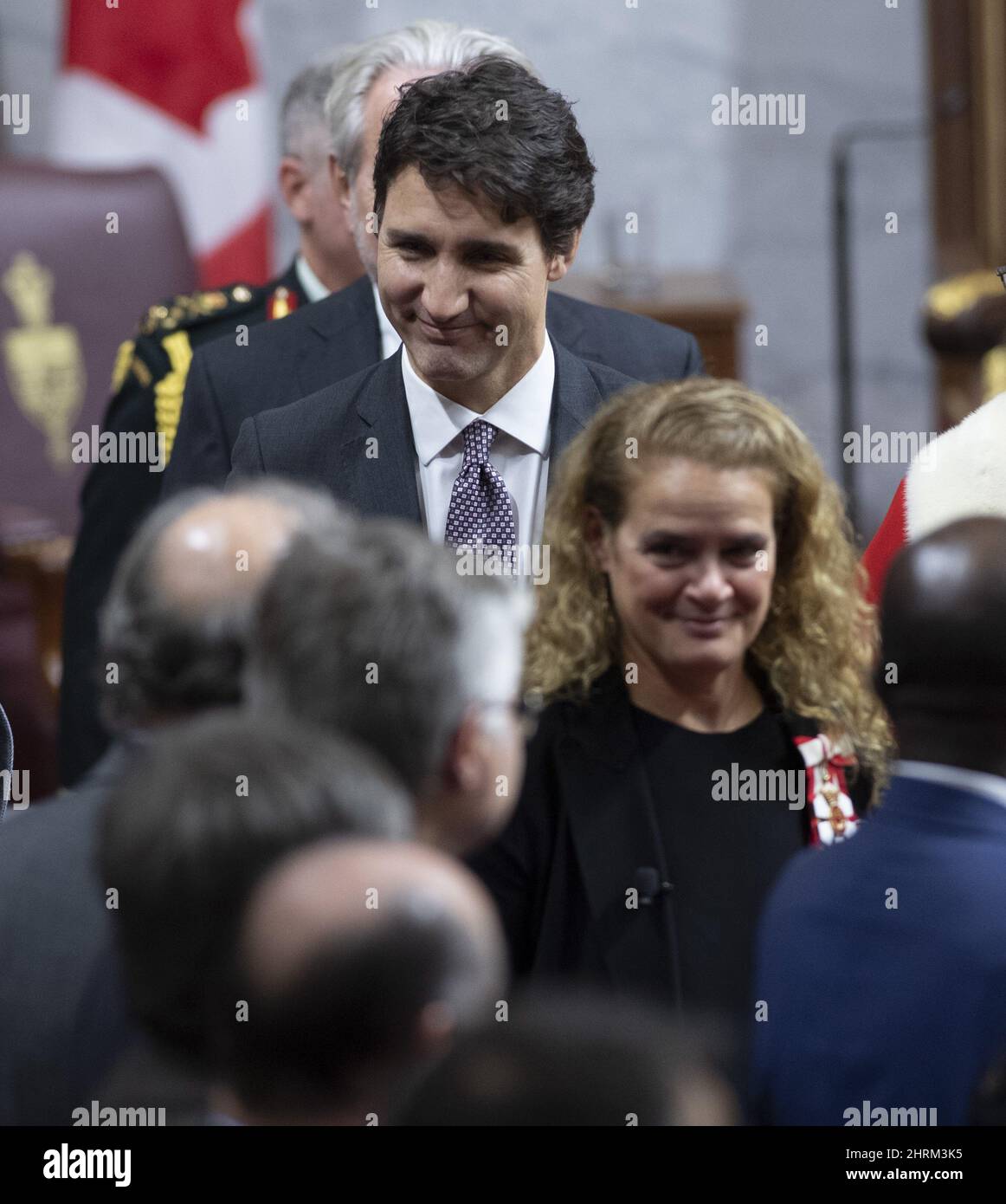 Prime Minister Justin Trudeau follows Governor General Julie Payette as she leaves the Senate ...