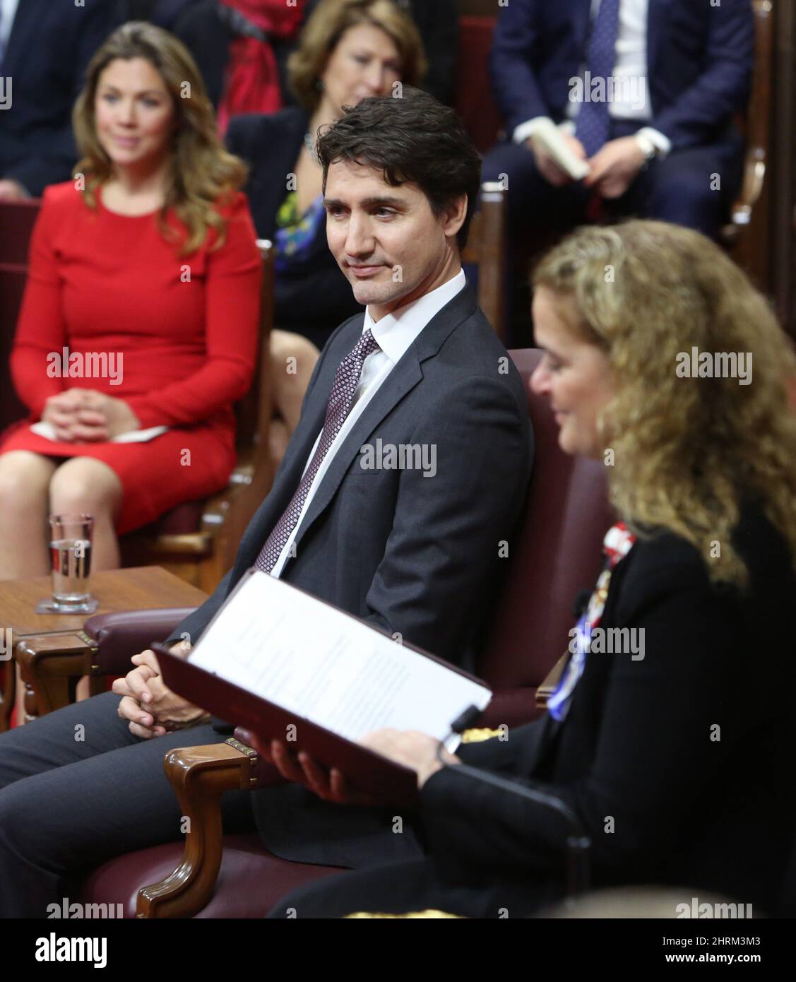 Prime Minister Justin Trudeau look on as Governor General Julie Payette delivers the Throne ...