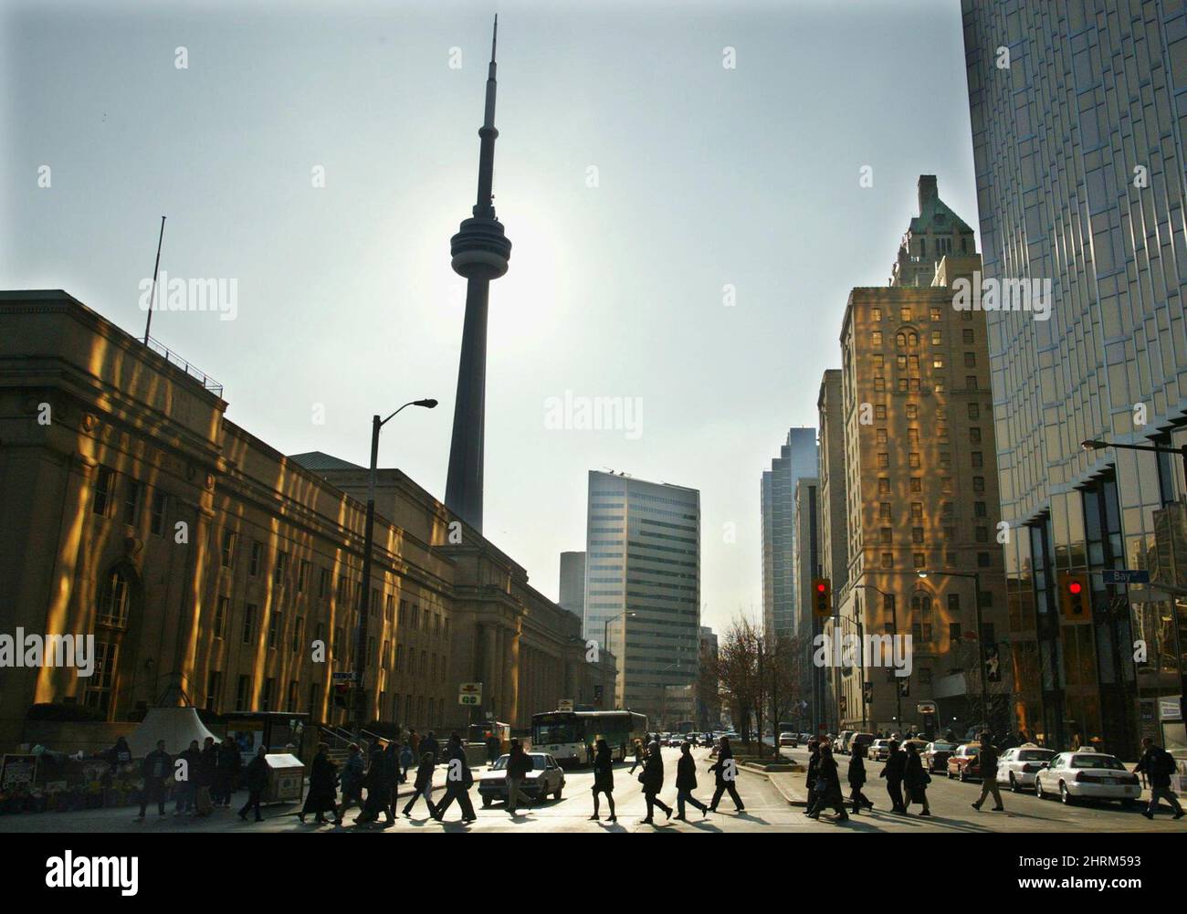 Commuters walk along Bay Street in downtown Toronto Tuesday March 12 ...