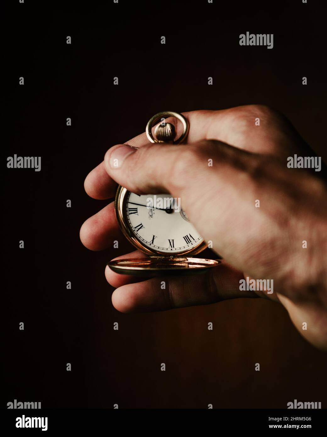 Gold finger watch hi-res stock photography and images - Alamy