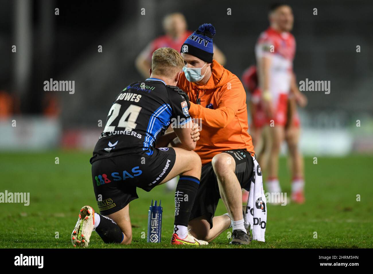 Harry Bowes #24 of Wakefield Trinity receives treatment on the pitch ...