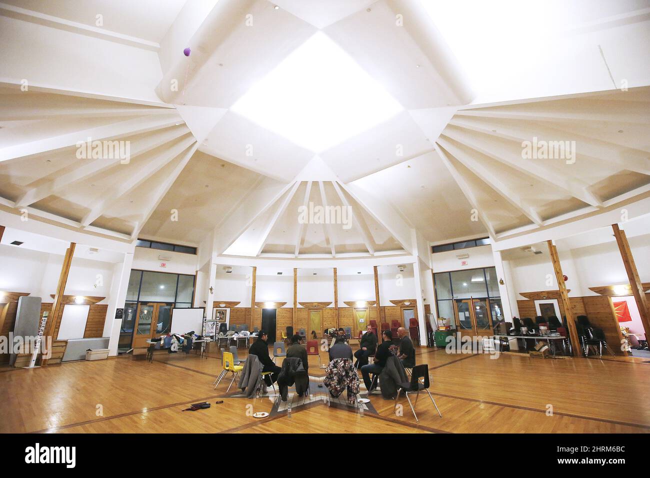 Ryan Beardy, former gang member and Healing Together founder, sits with ...