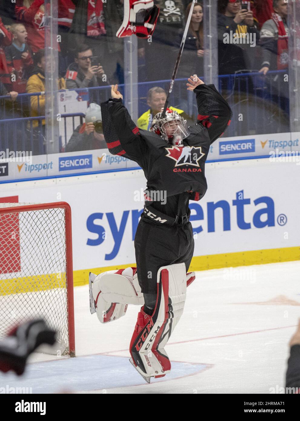 Canada's goaltender Joel Hofer celebrates after defeating Russia 4-3 in ...