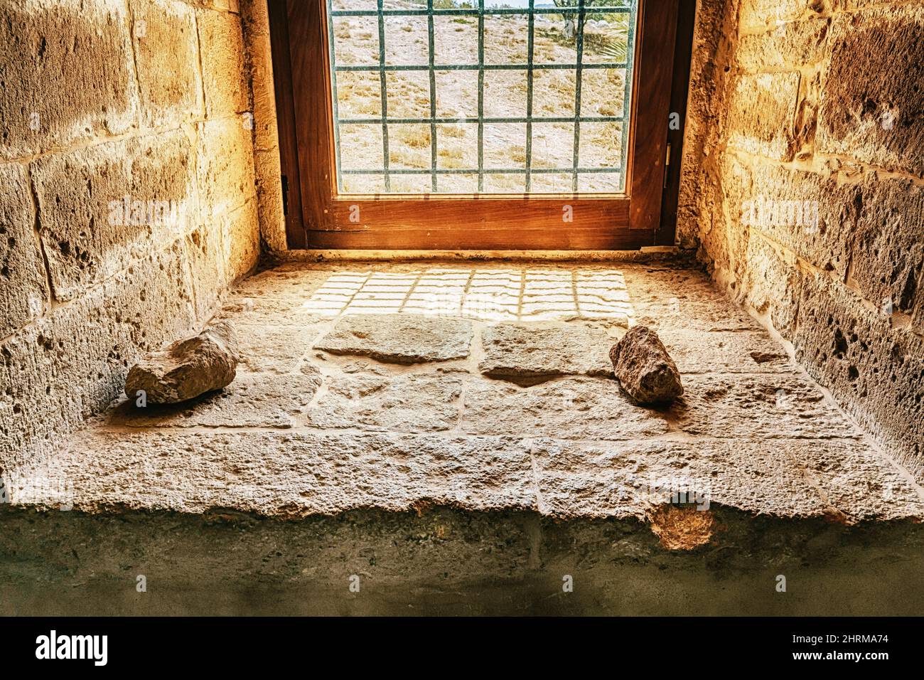 Glass window on an old stone building during daytime Stock Photo - Alamy
