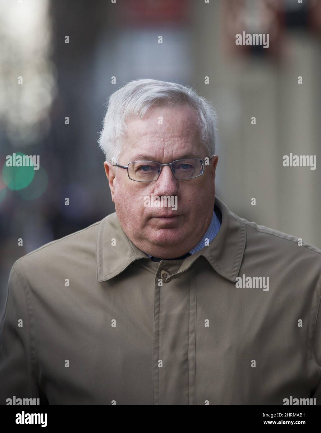 Retired neurologist Keith Hoyte leaves the courthouse in Calgary ...