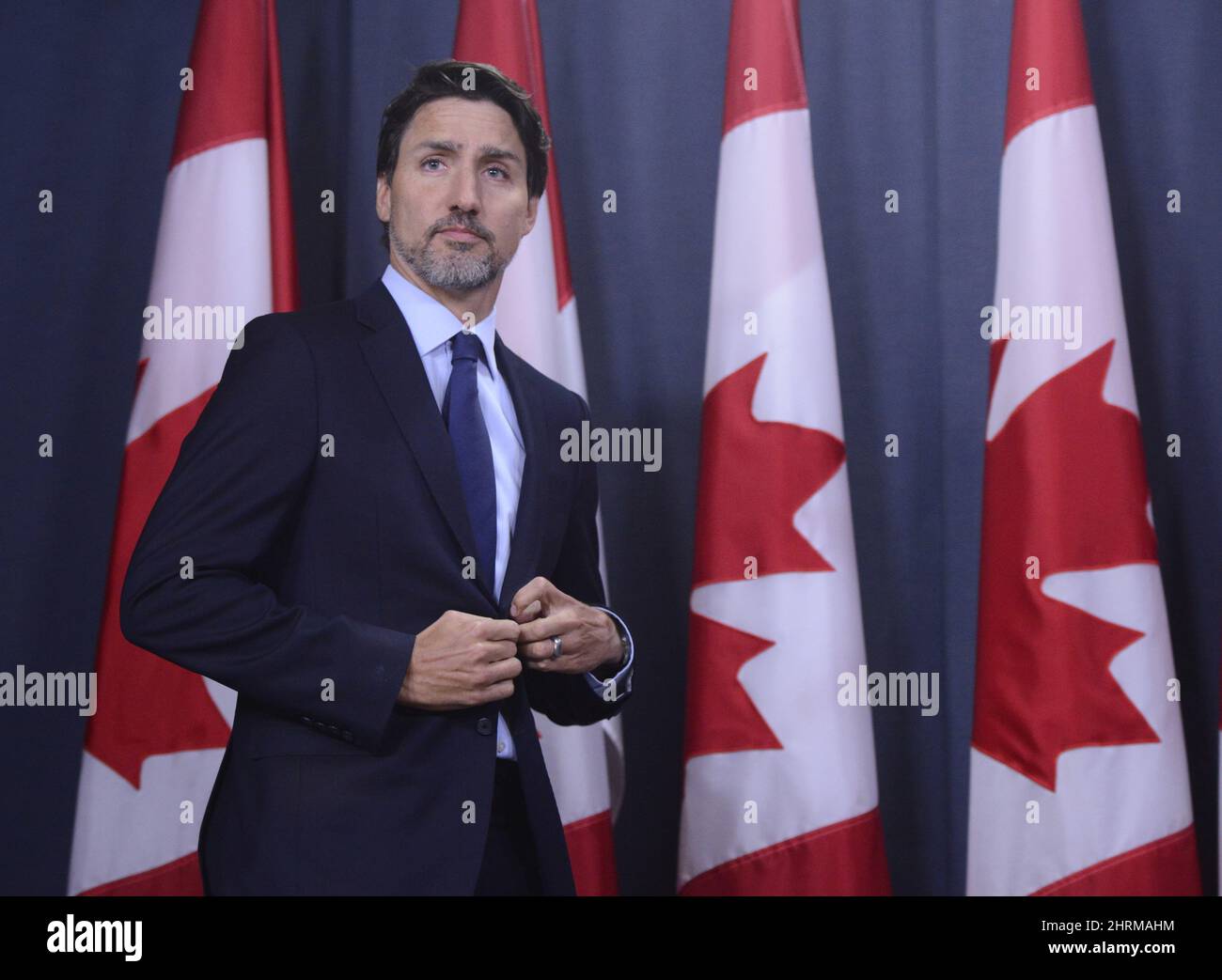 Prime Minister Justin Trudeau arrives for a news conference in Ottawa ...