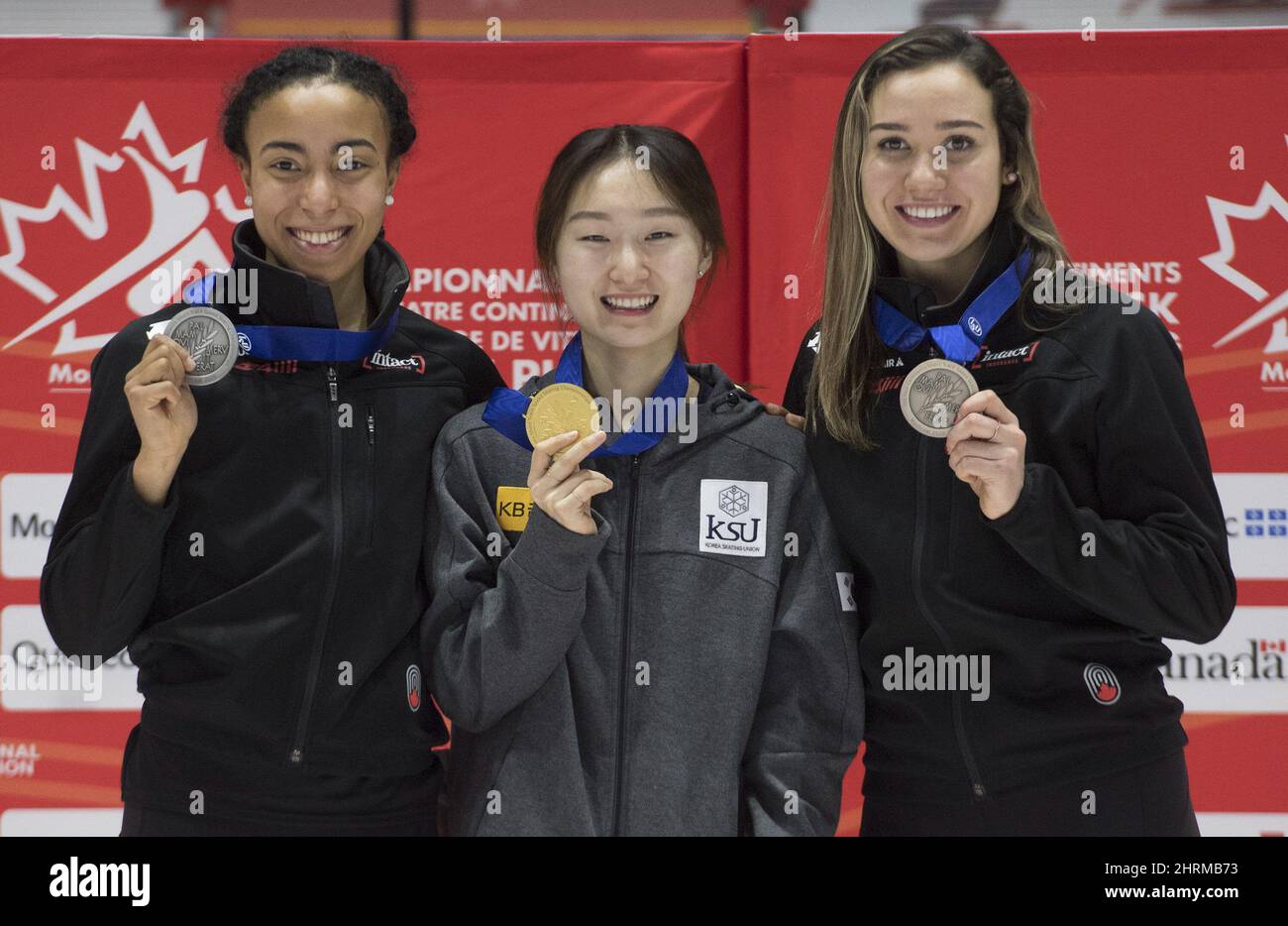 From left, Alyson Charles, of Canada, Choi Min Jeong, of South Korea ...