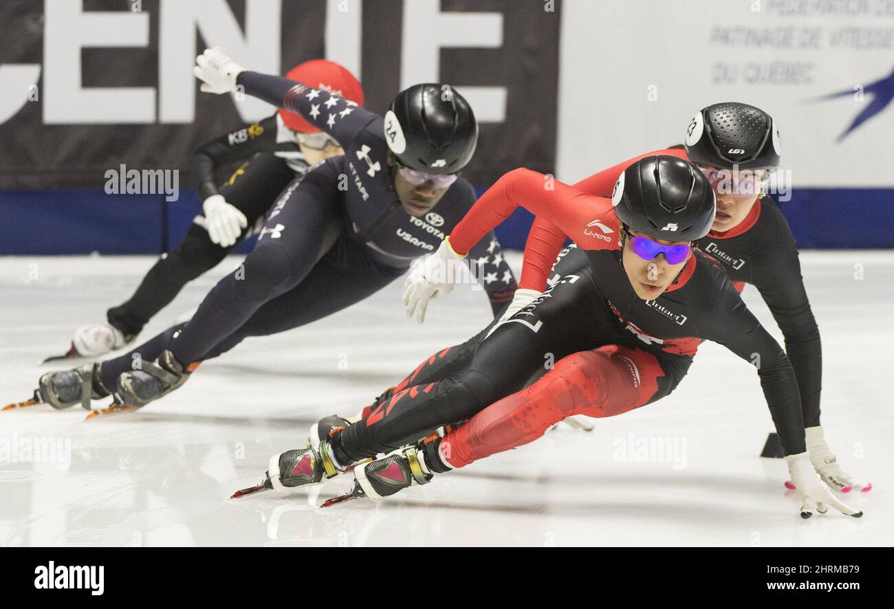 Alyson Charles of Canada skates to a second place finish ahead of Choi ...