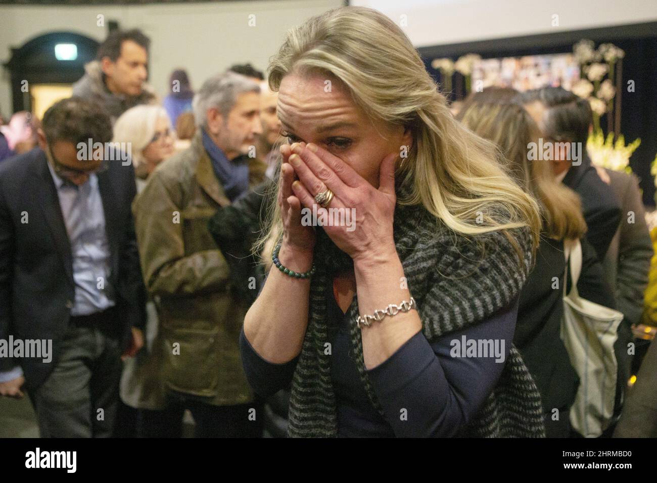 Celeste Poltak wipes away tears following a memorial organized by the ...