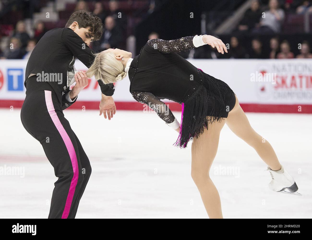 Piper Gilles's hair gets caught into the costume of Paul Poirier during ...