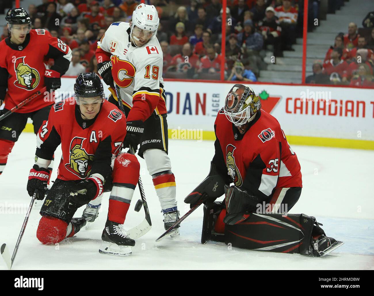 Ottawa Senators' Mark Borowiecki (74) defends against Calgary Flames ...