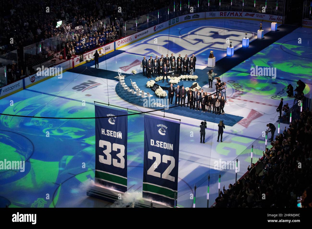 Former Vancouver Canucks players Henrik Sedin and his twin brother ...