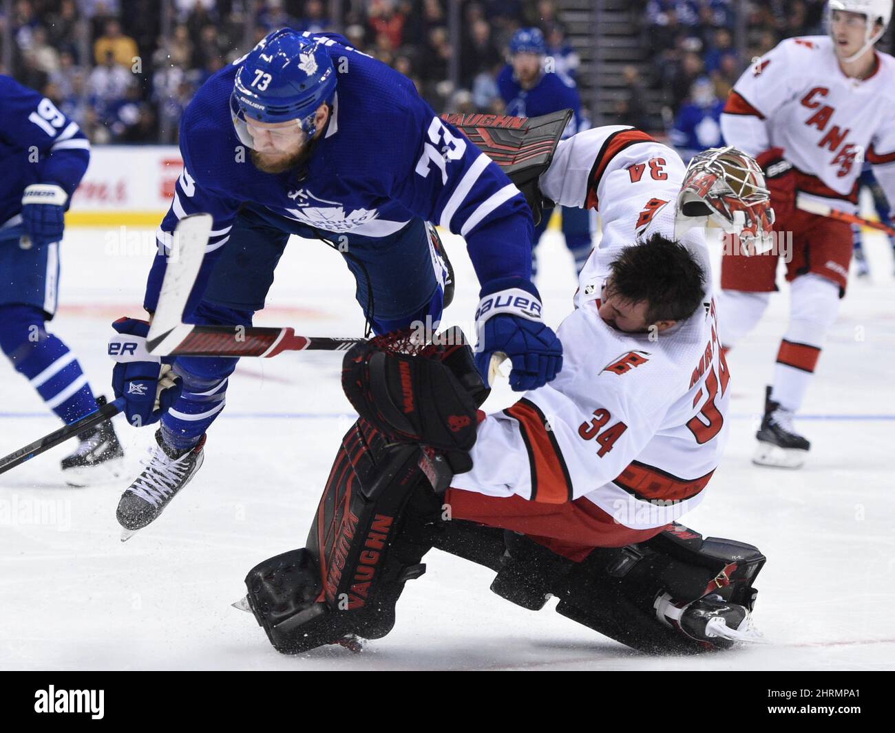 Carolina Hurricanes goaltender Petr Mrazek (34) hits the ice after ...