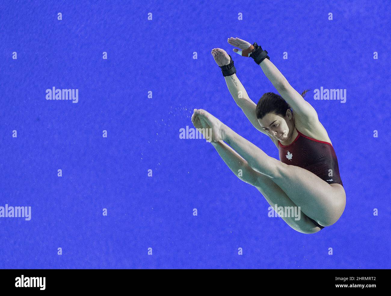 Meaghan Benfeito of Canada performs a practice dive ahead of ...
