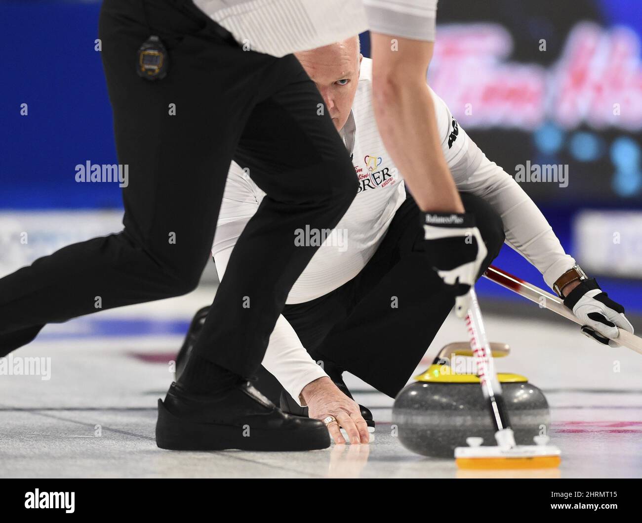 Team Howard skip Glenn Howard delivers a stone during the wild card ...