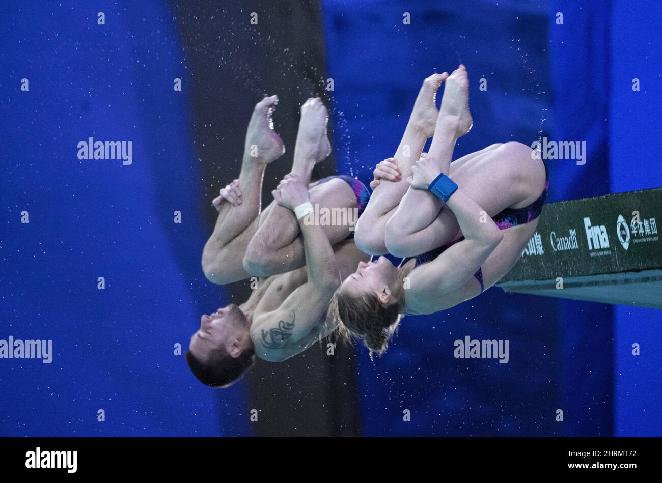 Ekaterina Beliaeva and Viktor Minibaev of Russia perform a dive in the mixed 10 metre platform ...
