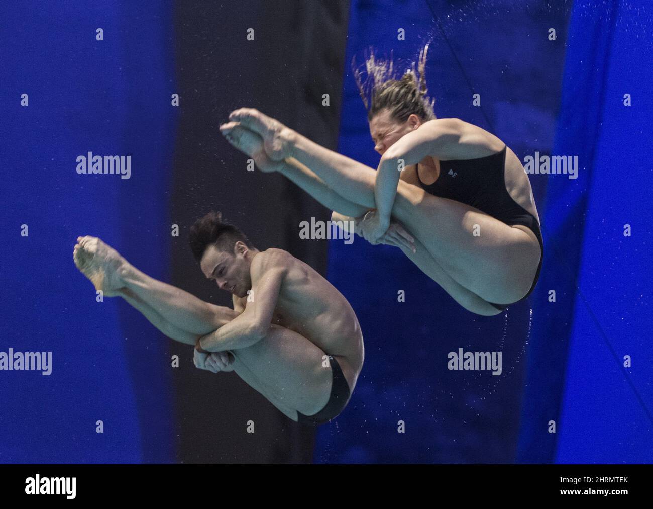 Thomas Daley and Grace Reid of Britain perform a dive during the 3 ...