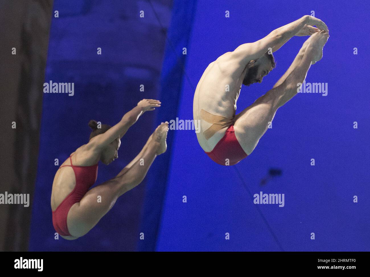 Francois Imbeau-Dulac and Jennifer Abel perform a dive during the 3 ...