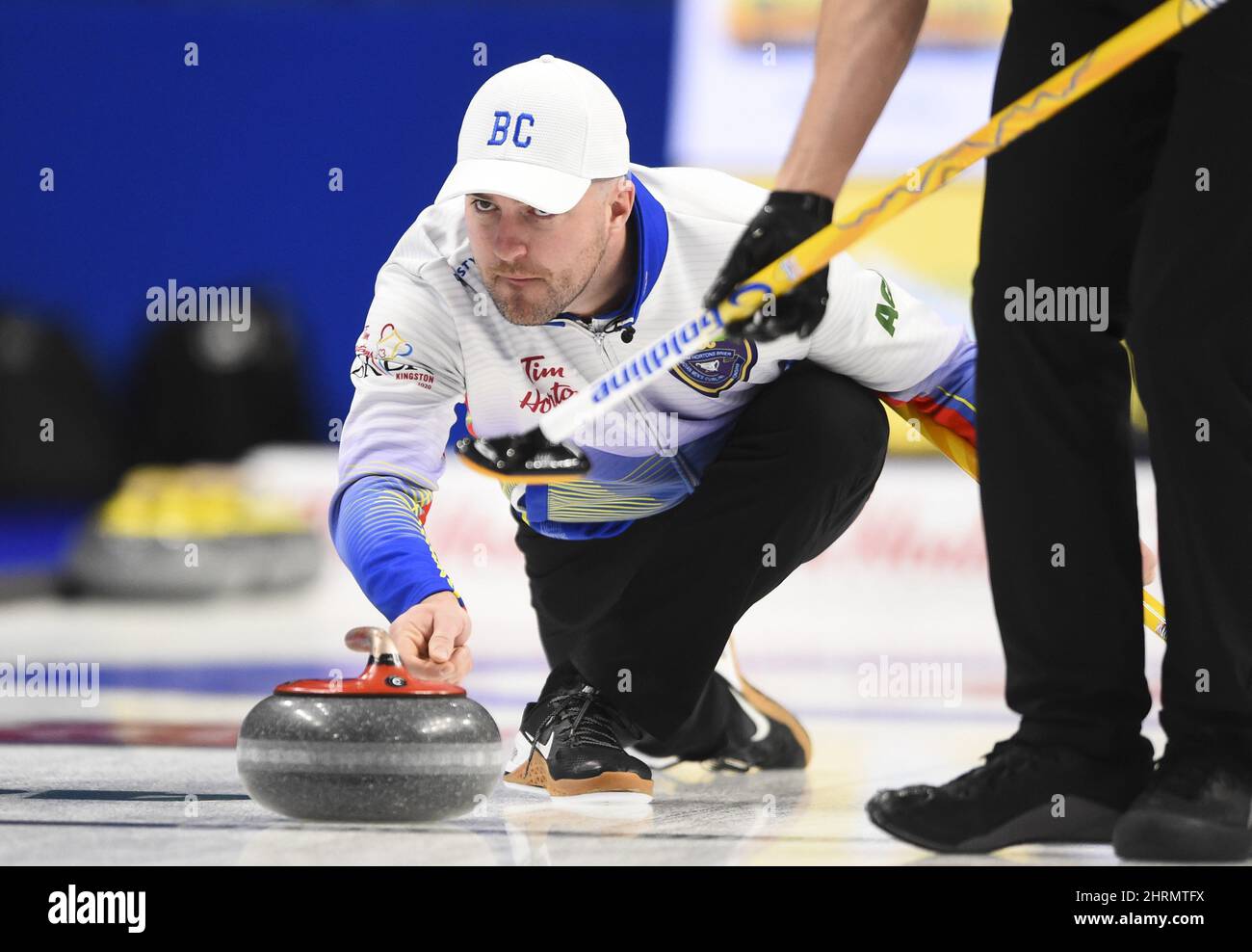 Team BC skip Steve Laycock delivers a stone as they take on ...