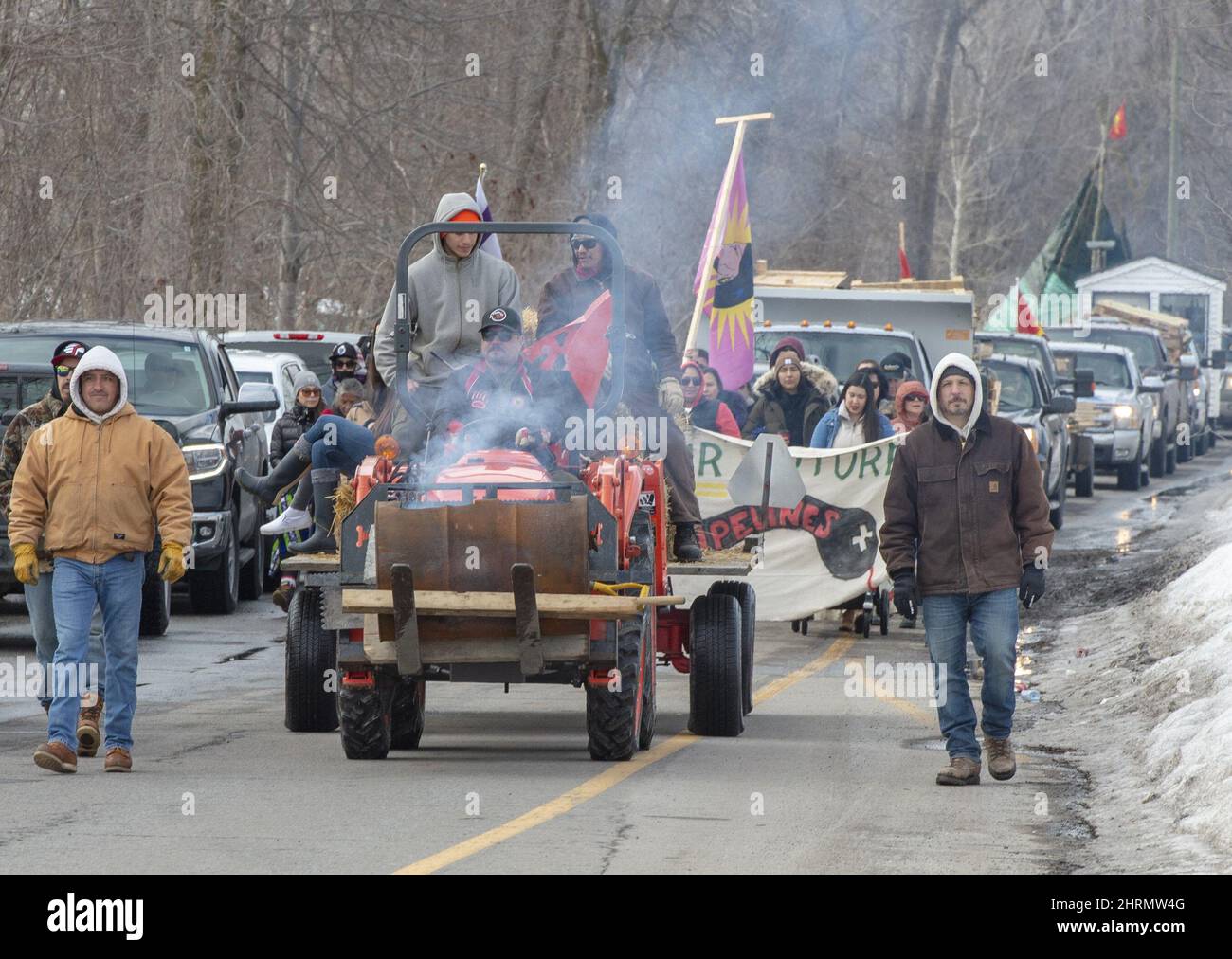 Members of the Mohawk community leave the blockade of the commuter rail ...