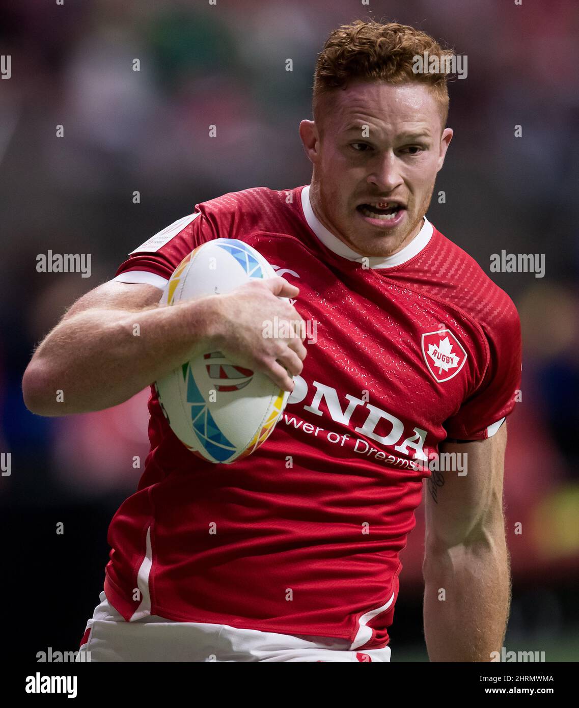 Canada's Connor Braid runs for a try against France during the Canada ...