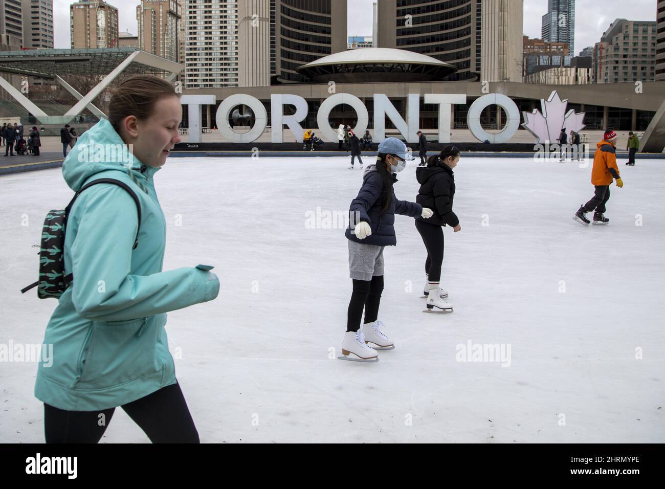 People use the skating rink at Nathan Phillips Square amid coronavirus ...