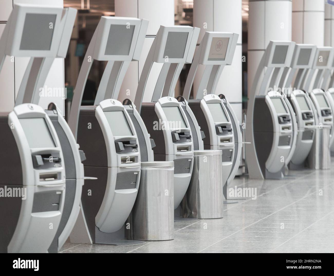 Empty self check-in desks are shown at Montrealâ€“Trudeau International Airport, Friday, March ...