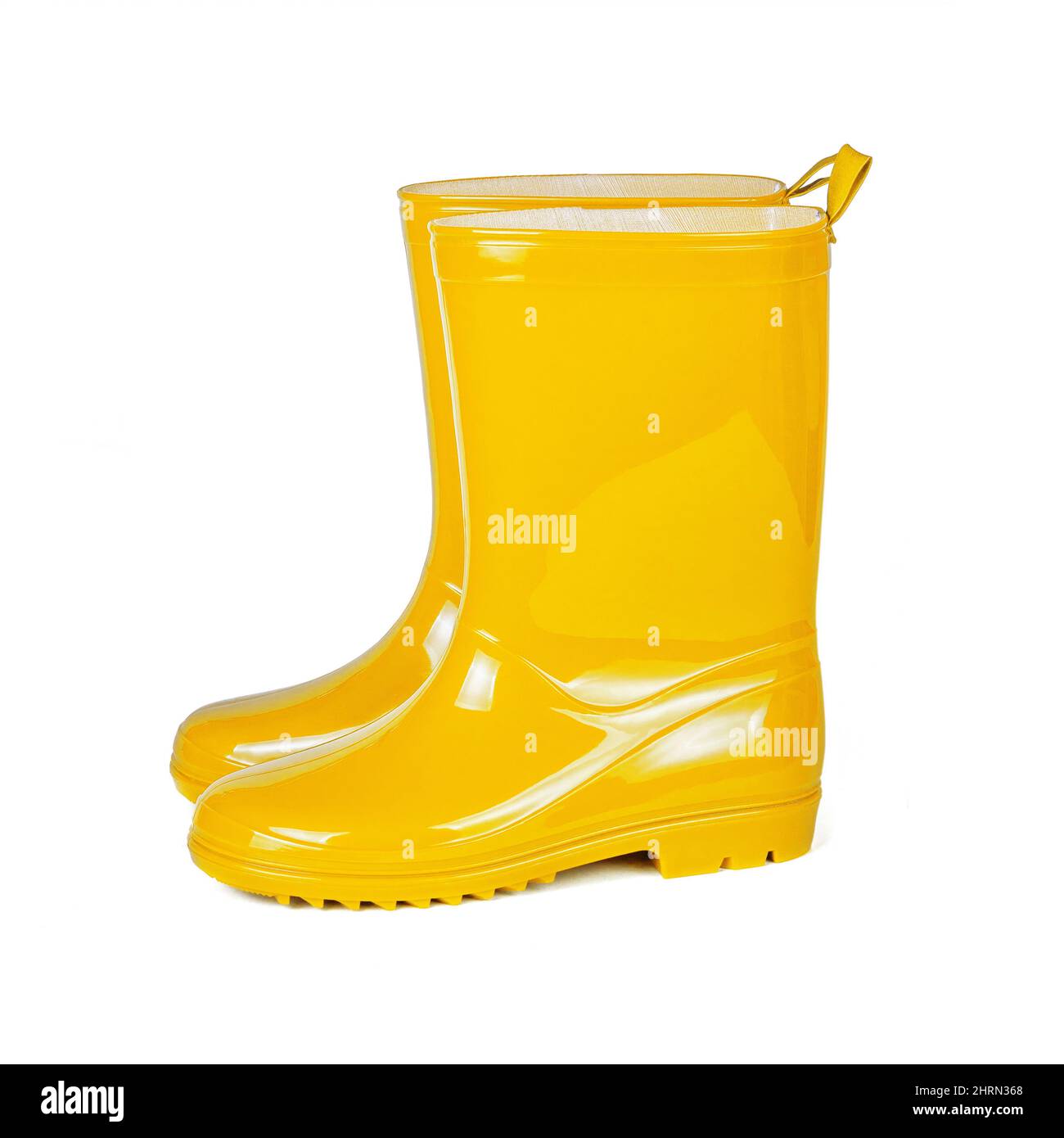 Yellow rubber boots isolated on white background Stock Photo - Alamy