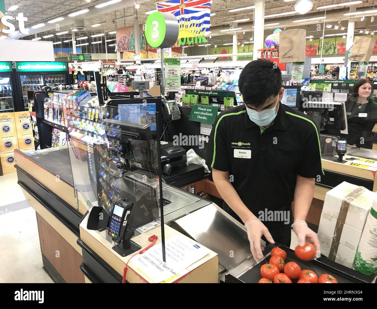 A plexiglass barrier is pictured creating a barrier to protect a ...