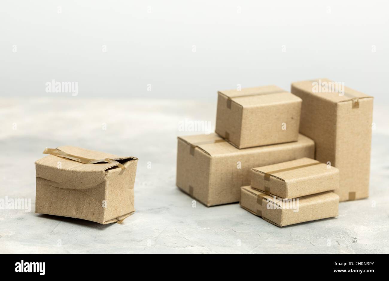Crumpled and broken box and whole Cardboard boxes Stock Photo - Alamy