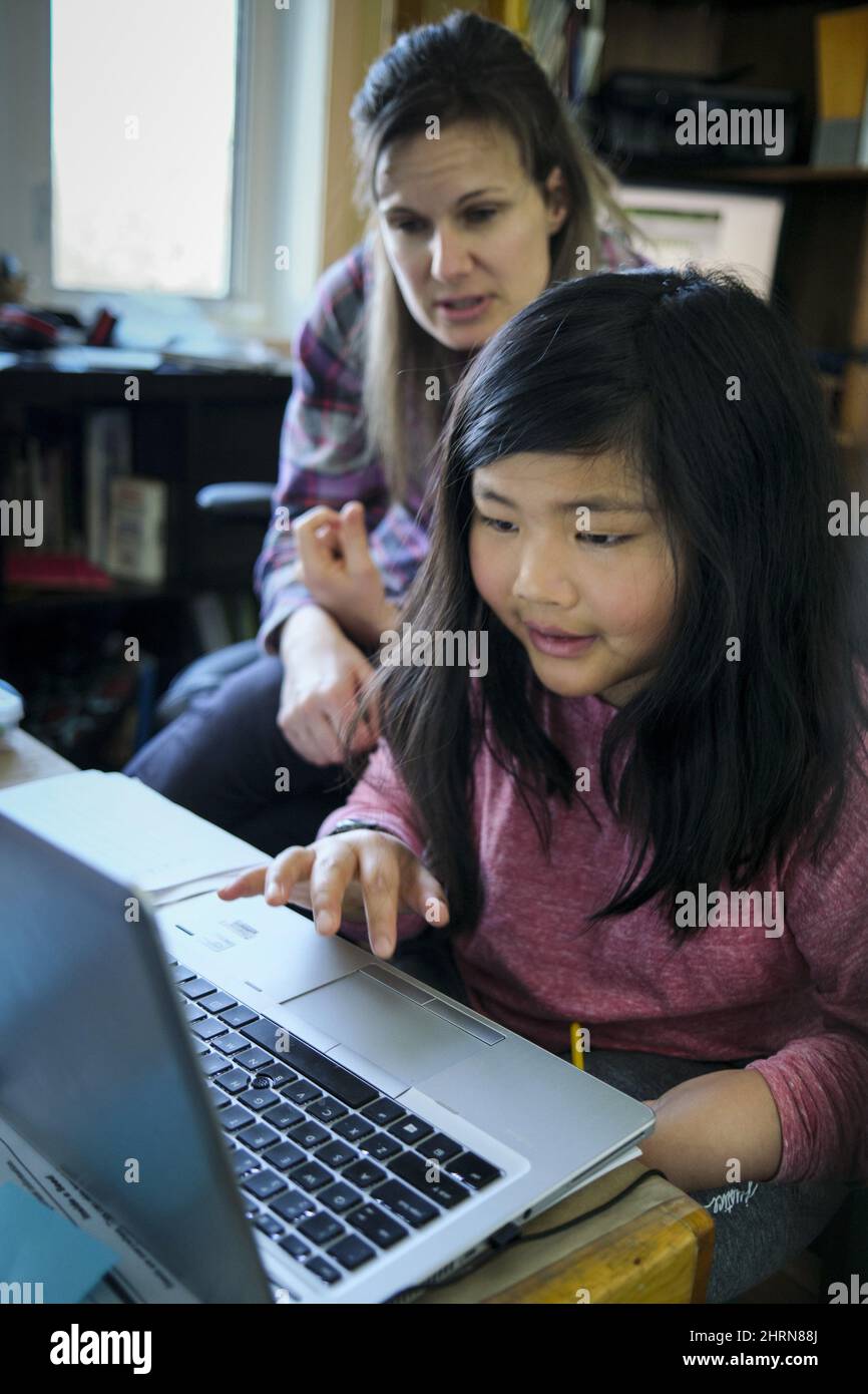 With Alberta schools closed Andrea Reid and her adopted daughter ...
