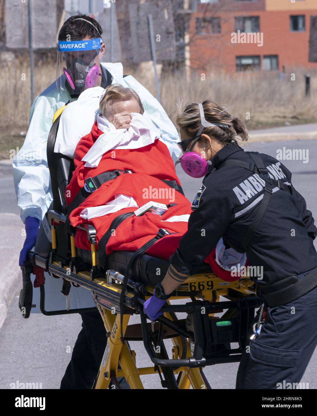 A patient is wheeled to the emergency unit of the Verdun Hospital in ...