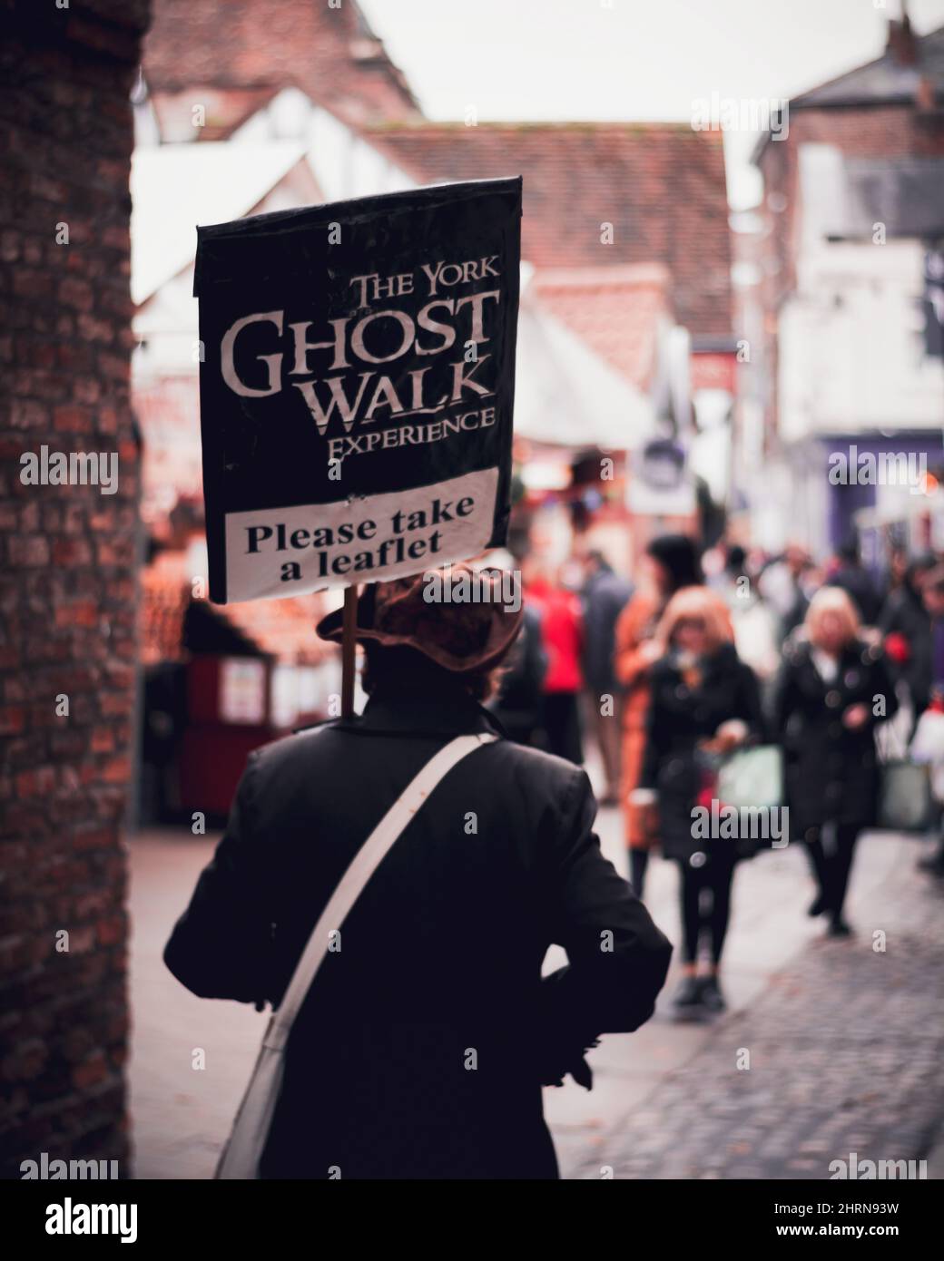 The York Ghost Walk tour guide with sign Stock Photo - Alamy